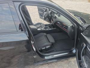 Black BMW 118 2013 in Silute, with an engine capacity of 2.00 L and mileage of 245 thousand km for 6400 €, photo 10 on AUTOMOTO.COM.LV