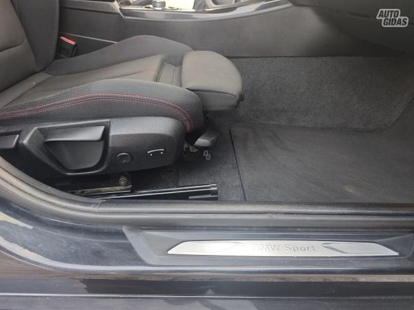 Black BMW 118 2013 in Silute, with an engine capacity of 2.00 L and mileage of 245 thousand km for 6400 €, photo 11 on AUTOMOTO.COM.LV