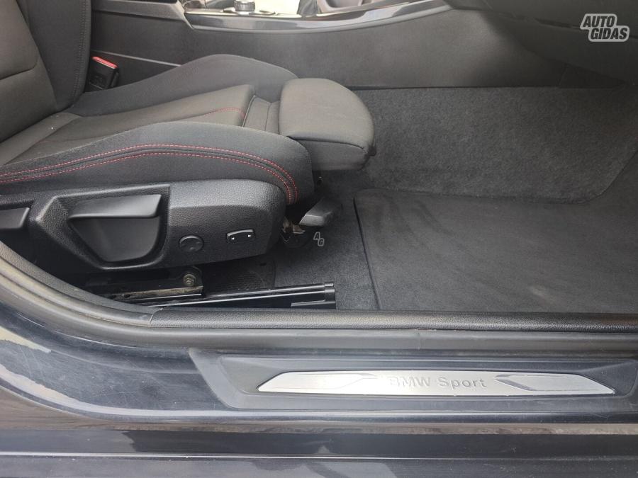 Black BMW 118 2013 in Silute, with an engine capacity of 2.00 L and mileage of 245 thousand km for 6400 €, photo 11 on AUTOMOTO.COM.LV