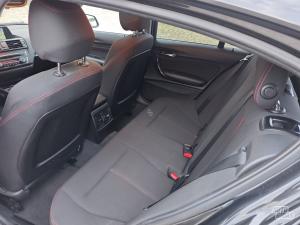 Black BMW 118 2013 in Silute, with an engine capacity of 2.00 L and mileage of 245 thousand km for 6400 €, photo 13 on AUTOMOTO.COM.LV
