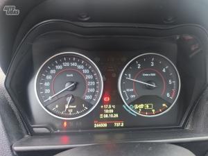 Black BMW 118 2013 in Silute, with an engine capacity of 2.00 L and mileage of 245 thousand km for 6400 €, photo 15 on AUTOMOTO.COM.LV