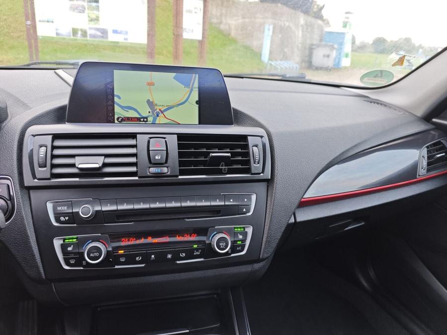 Black BMW 118 2013 in Silute, with an engine capacity of 2.00 L and mileage of 245 thousand km for 6400 €, photo 16 on AUTOMOTO.COM.LV