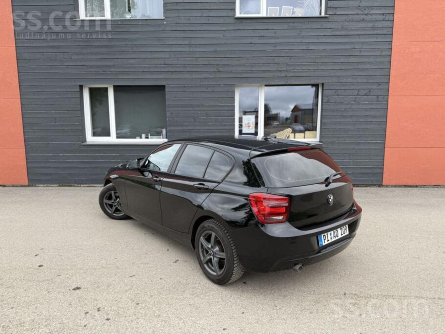Black BMW 118 2014 in Cesis, with an engine capacity of 2.00 L and mileage of 252 thousand km for 7990 €, photo 6 on AUTOMOTO.COM.LV