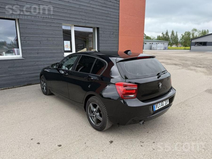 Black BMW 118 2014 in Cesis, with an engine capacity of 2.00 L and mileage of 252 thousand km for 7990 €, photo 22 on AUTOMOTO.COM.LV