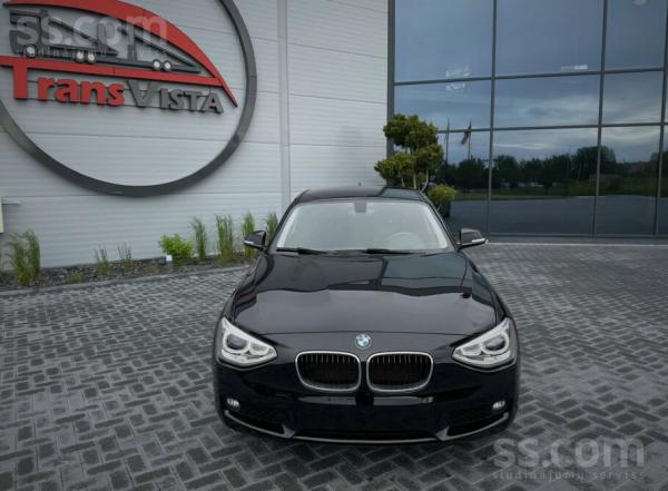 Black BMW 118 2014 in Telschi, with an engine capacity of 2.00 L and mileage of 201 thousand km for 6699 €, photo 3 on AUTOMOTO.COM.LV