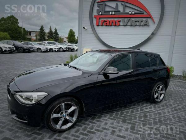 Black BMW 118 2014 in Telschi, with an engine capacity of 2.00 L and mileage of 201 thousand km for 6699 €, photo 5 on AUTOMOTO.COM.LV