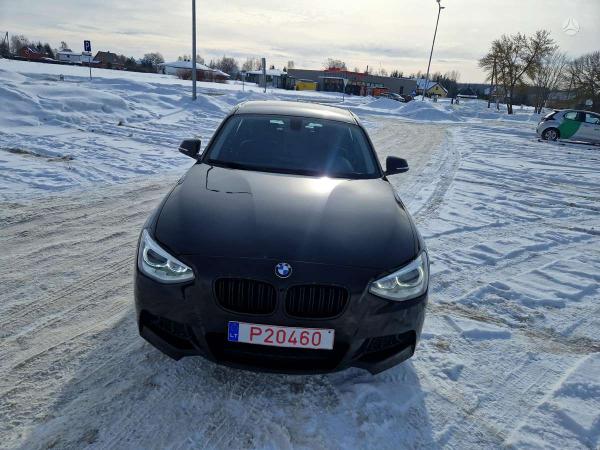 Black BMW 118 2014 in Kaunas, with an engine capacity of 2.00 L and mileage of 211 thousand km for 8250 €, photo 2 on AUTOMOTO.COM.LV