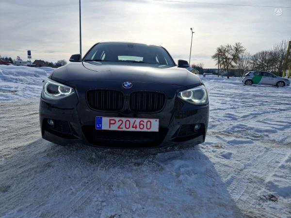 Black BMW 118 2014 in Kaunas, with an engine capacity of 2.00 L and mileage of 211 thousand km for 8250 €, photo 4 on AUTOMOTO.COM.LV