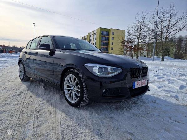 Black BMW 118 2014 in Kaunas, with an engine capacity of 2.00 L and mileage of 211 thousand km for 8250 €, photo 5 on AUTOMOTO.COM.LV