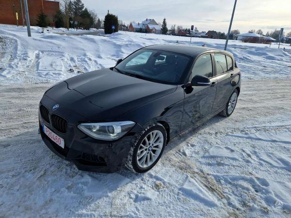 Black BMW 118 2014 in Kaunas, with an engine capacity of 2.00 L and mileage of 211 thousand km for 8250 €, photo 6 on AUTOMOTO.COM.LV