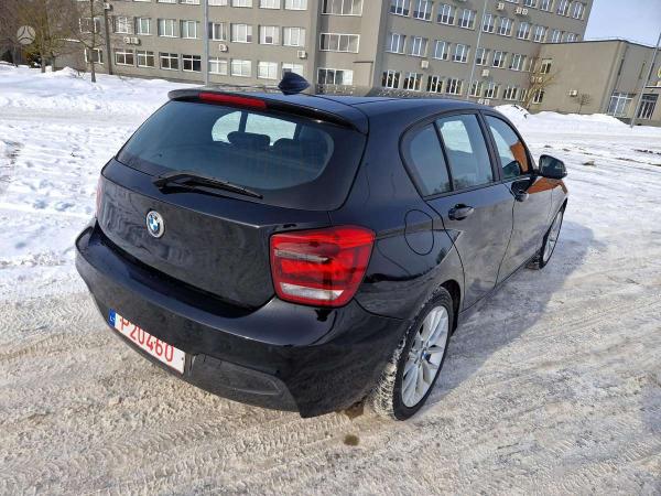 Black BMW 118 2014 in Kaunas, with an engine capacity of 2.00 L and mileage of 211 thousand km for 8250 €, photo 8 on AUTOMOTO.COM.LV