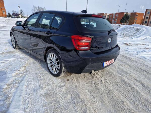 Black BMW 118 2014 in Kaunas, with an engine capacity of 2.00 L and mileage of 211 thousand km for 8250 €, photo 9 on AUTOMOTO.COM.LV