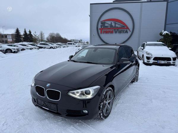 Black BMW 118 2014 in Telschi, with an engine capacity of 2.00 L and mileage of 202 thousand km for 6999 €, photo 1 on AUTOMOTO.COM.LV