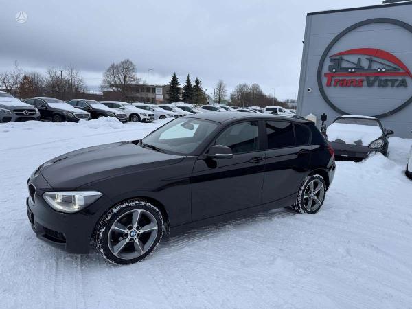 Black BMW 118 2014 in Telschi, with an engine capacity of 2.00 L and mileage of 202 thousand km for 6999 €, photo 2 on AUTOMOTO.COM.LV