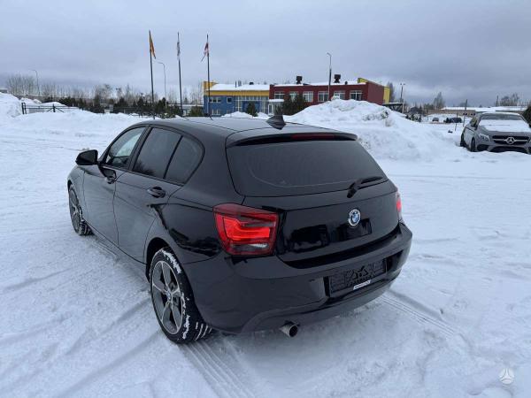 Black BMW 118 2014 in Telschi, with an engine capacity of 2.00 L and mileage of 202 thousand km for 6999 €, photo 4 on AUTOMOTO.COM.LV