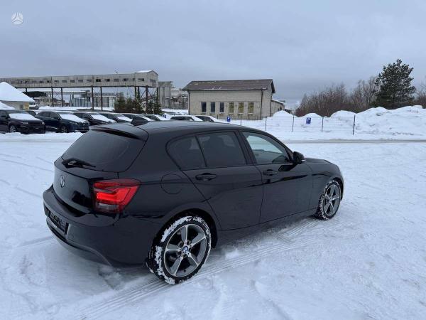 Black BMW 118 2014 in Telschi, with an engine capacity of 2.00 L and mileage of 202 thousand km for 6999 €, photo 7 on AUTOMOTO.COM.LV