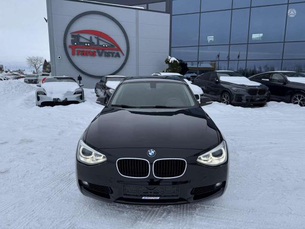 Black BMW 118 2014 in Telschi, with an engine capacity of 2.00 L and mileage of 202 thousand km for 6999 €, photo 10 on AUTOMOTO.COM.LV