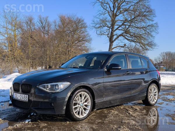 Black BMW 118 2014 in Riga, with an engine capacity of 2.00 L and mileage of 197 thousand km for 7000 €, photo 2 on AUTOMOTO.COM.LV