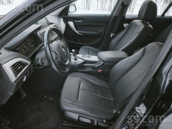 Black BMW 118 2014 in Riga, with an engine capacity of 2.00 L and mileage of 197 thousand km for 7000 €, photo 6 on AUTOMOTO.COM.LV