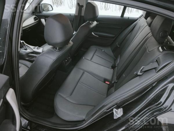 Black BMW 118 2014 in Riga, with an engine capacity of 2.00 L and mileage of 197 thousand km for 7000 €, photo 8 on AUTOMOTO.COM.LV