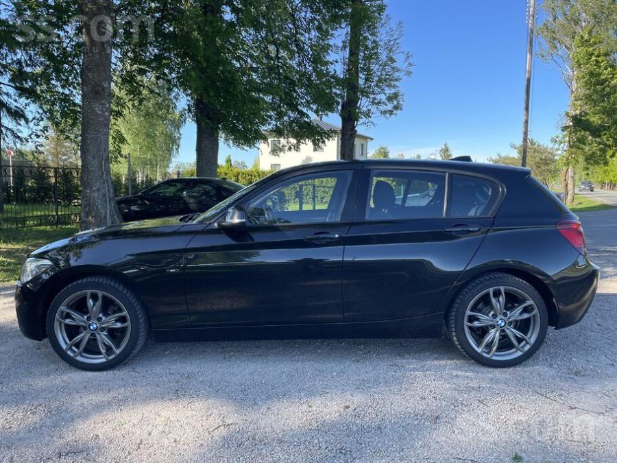 Black BMW 118 2014 in Riga, with an engine capacity of 2.00 L and mileage of 180 thousand km for 7990 €, photo 3 on AUTOMOTO.COM.LV