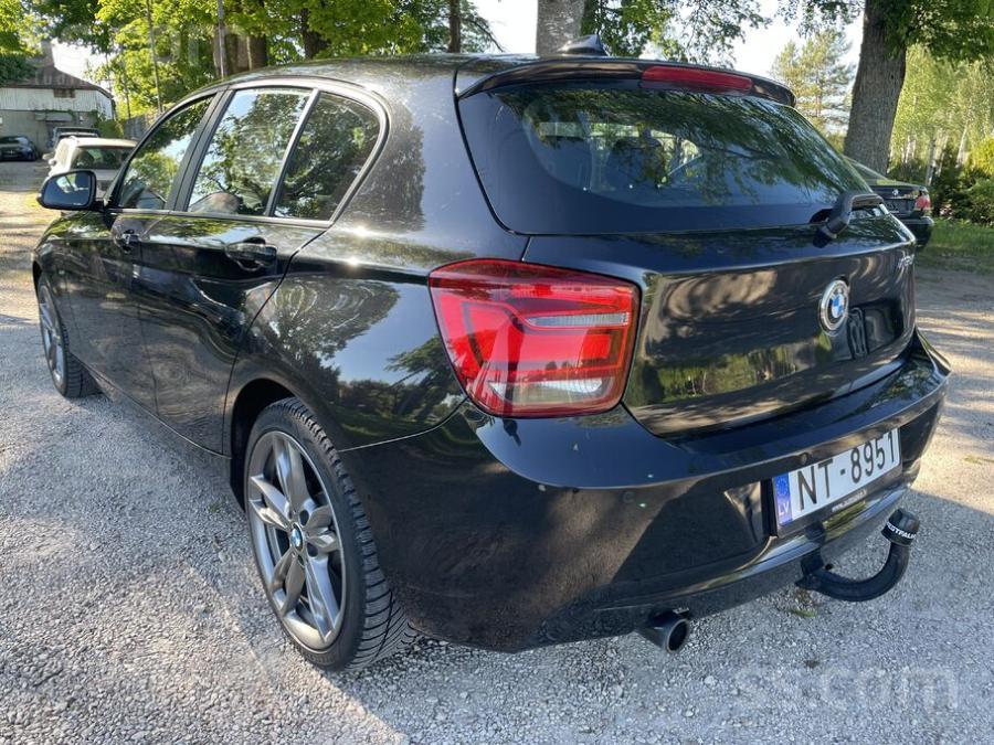Black BMW 118 2014 in Riga, with an engine capacity of 2.00 L and mileage of 180 thousand km for 7990 €, photo 4 on AUTOMOTO.COM.LV