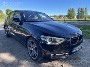 Black BMW 118 2014 in Riga, with an engine capacity of 2.00 L and mileage of 180 thousand km for 7990 €, photo 8 on AUTOMOTO.COM.LV