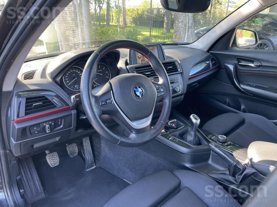 Black BMW 118 2014 in Riga, with an engine capacity of 2.00 L and mileage of 180 thousand km for 7990 €, photo 10 on AUTOMOTO.COM.LV