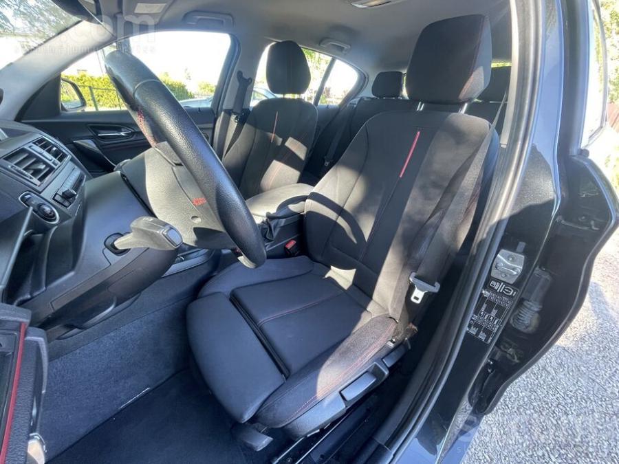 Black BMW 118 2014 in Riga, with an engine capacity of 2.00 L and mileage of 180 thousand km for 7990 €, photo 12 on AUTOMOTO.COM.LV