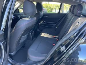 Black BMW 118 2014 in Riga, with an engine capacity of 2.00 L and mileage of 180 thousand km for 7990 €, photo 13 on AUTOMOTO.COM.LV