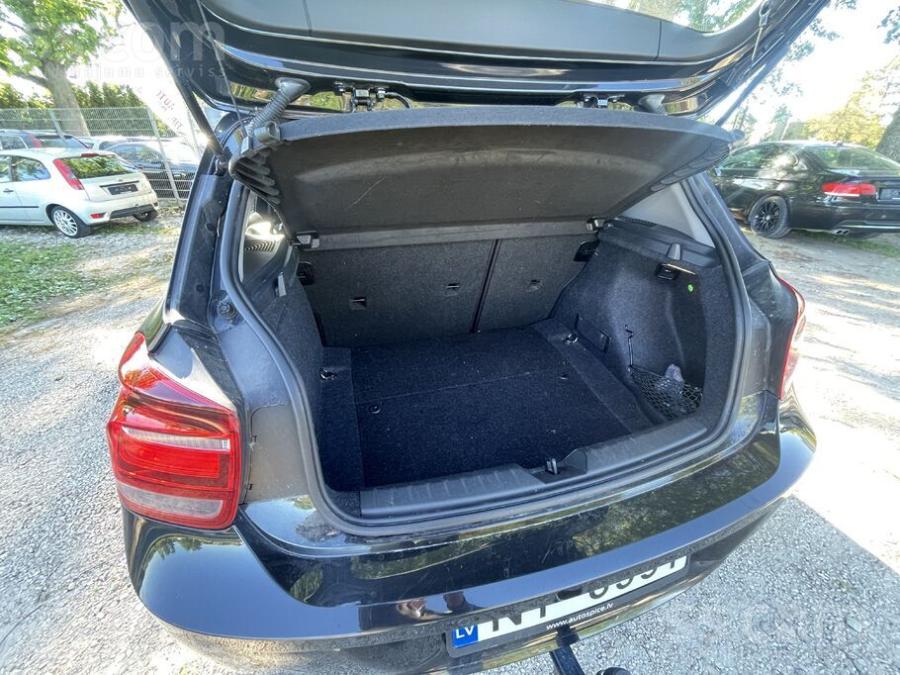 Black BMW 118 2014 in Riga, with an engine capacity of 2.00 L and mileage of 180 thousand km for 7990 €, photo 15 on AUTOMOTO.COM.LV