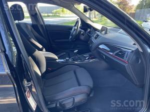 Black BMW 118 2014 in Riga, with an engine capacity of 2.00 L and mileage of 180 thousand km for 7990 €, photo 17 on AUTOMOTO.COM.LV