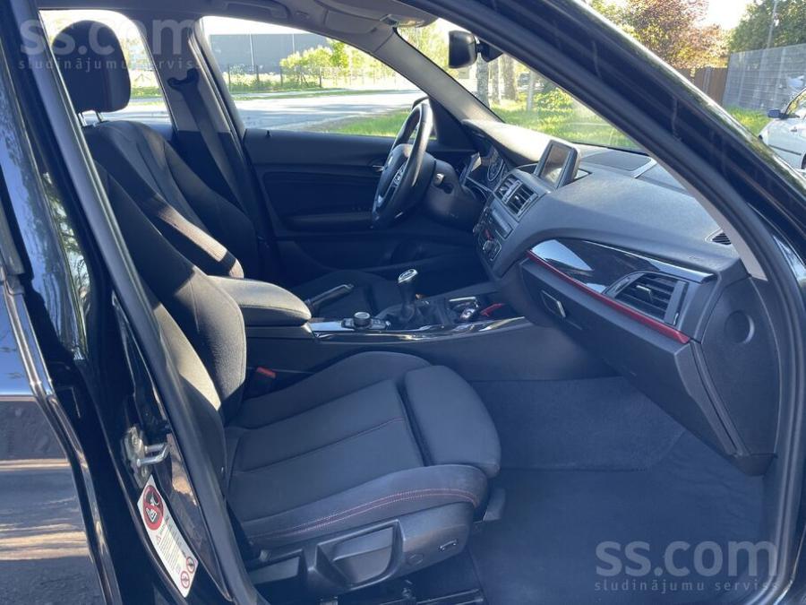 Black BMW 118 2014 in Riga, with an engine capacity of 2.00 L and mileage of 180 thousand km for 7990 €, photo 17 on AUTOMOTO.COM.LV