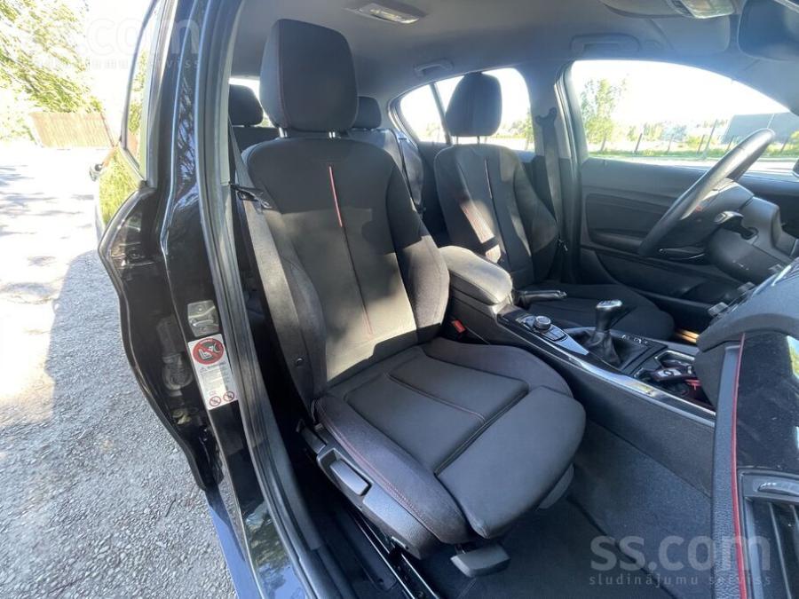 Black BMW 118 2014 in Riga, with an engine capacity of 2.00 L and mileage of 180 thousand km for 7990 €, photo 18 on AUTOMOTO.COM.LV