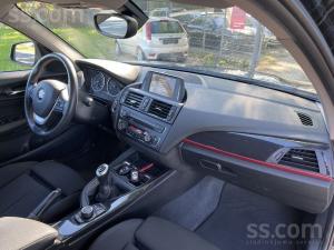 Black BMW 118 2014 in Riga, with an engine capacity of 2.00 L and mileage of 180 thousand km for 7990 €, photo 19 on AUTOMOTO.COM.LV