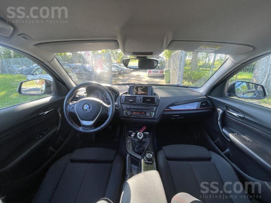 Black BMW 118 2014 in Riga, with an engine capacity of 2.00 L and mileage of 180 thousand km for 7990 €, photo 20 on AUTOMOTO.COM.LV