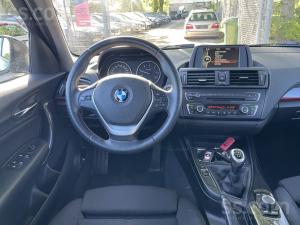 Black BMW 118 2014 in Riga, with an engine capacity of 2.00 L and mileage of 180 thousand km for 7990 €, photo 21 on AUTOMOTO.COM.LV