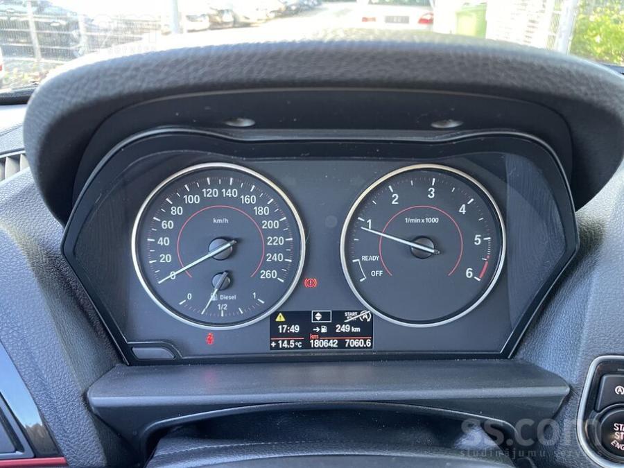 Black BMW 118 2014 in Riga, with an engine capacity of 2.00 L and mileage of 180 thousand km for 7990 €, photo 23 on AUTOMOTO.COM.LV