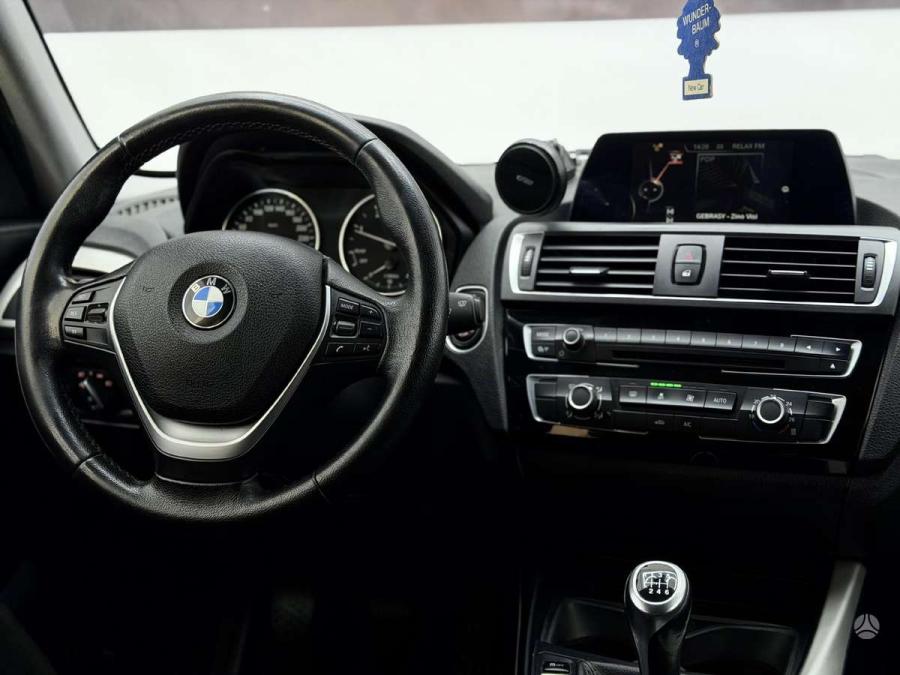 Black BMW 118 2015 in Vilnius, with an engine capacity of 2.00 L and mileage of 291 thousand km for 9390 €, photo 15 on AUTOMOTO.COM.LV