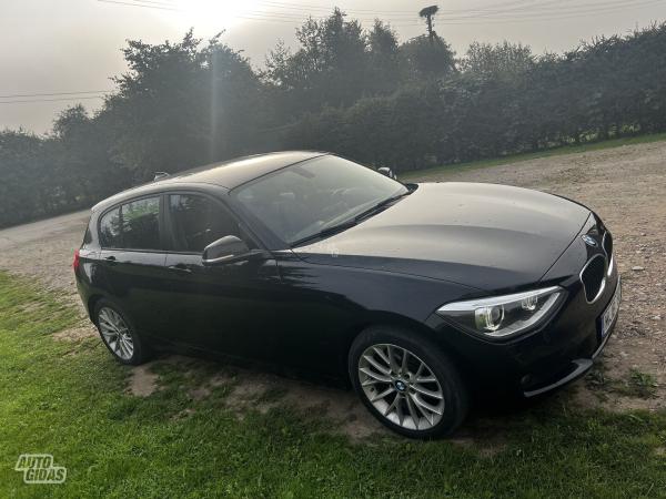 Black BMW 118 2015 in Kazlu Ruda, with an engine capacity of 2.00 L and mileage of 275 thousand km for 7000 €, photo 2 on AUTOMOTO.COM.LV