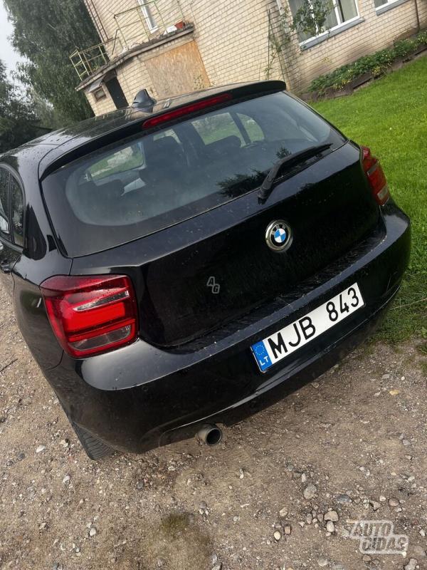 Black BMW 118 2015 in Kazlu Ruda, with an engine capacity of 2.00 L and mileage of 275 thousand km for 7000 €, photo 4 on AUTOMOTO.COM.LV
