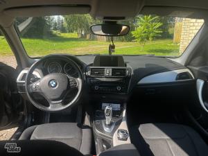 Black BMW 118 2015 in Kazlu Ruda, with an engine capacity of 2.00 L and mileage of 275 thousand km for 7000 €, photo 5 on AUTOMOTO.COM.LV