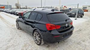 Black BMW 118 2016 in Marijampole, with an engine capacity of 2.00 L and mileage of 214 thousand km for 7690 €, photo 6 on AUTOMOTO.COM.LV