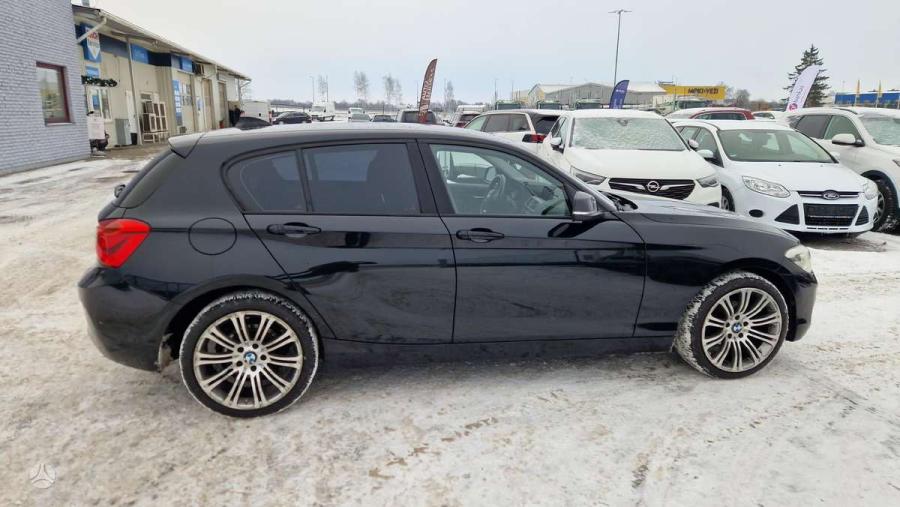 Black BMW 118 2016 in Marijampole, with an engine capacity of 2.00 L and mileage of 214 thousand km for 7690 €, photo 9 on AUTOMOTO.COM.LV