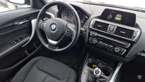 Black BMW 118 2016 in Marijampole, with an engine capacity of 2.00 L and mileage of 214 thousand km for 7690 €, photo 15 on AUTOMOTO.COM.LV