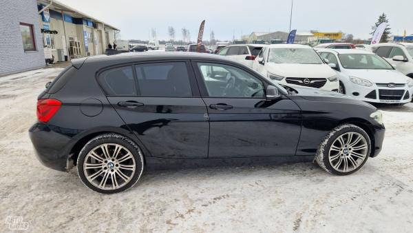Black BMW 118 2016 in Marijampole, with an engine capacity of 2.00 L and mileage of 214 thousand km for 7690 €, photo 6 on AUTOMOTO.COM.LV