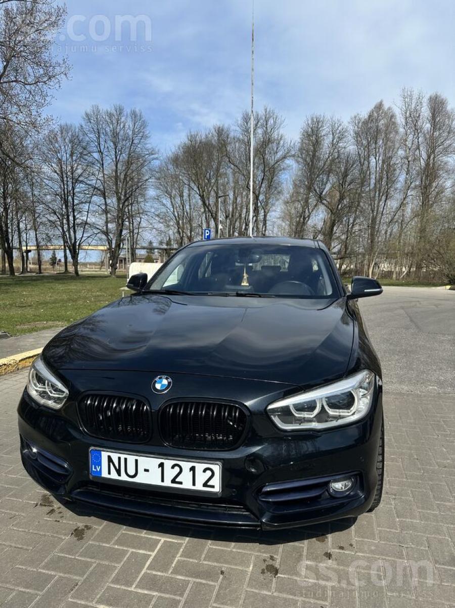 Black BMW 118 2017 in Riga, with an engine capacity of 2.00 L and mileage of 219 thousand km for 11700 €, photo 1 on AUTOMOTO.COM.LV