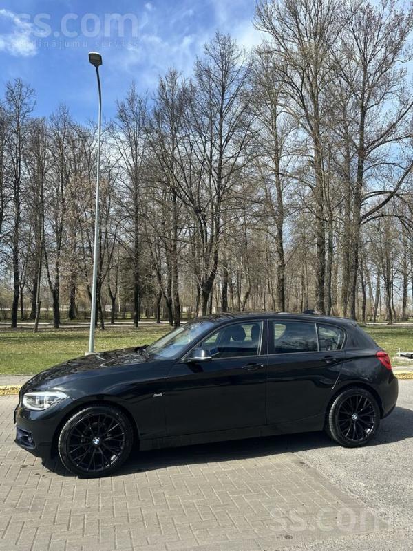 Black BMW 118 2017 in Riga, with an engine capacity of 2.00 L and mileage of 219 thousand km for 11700 €, photo 2 on AUTOMOTO.COM.LV
