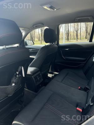 Black BMW 118 2017 in Riga, with an engine capacity of 2.00 L and mileage of 219 thousand km for 11700 €, photo 7 on AUTOMOTO.COM.LV