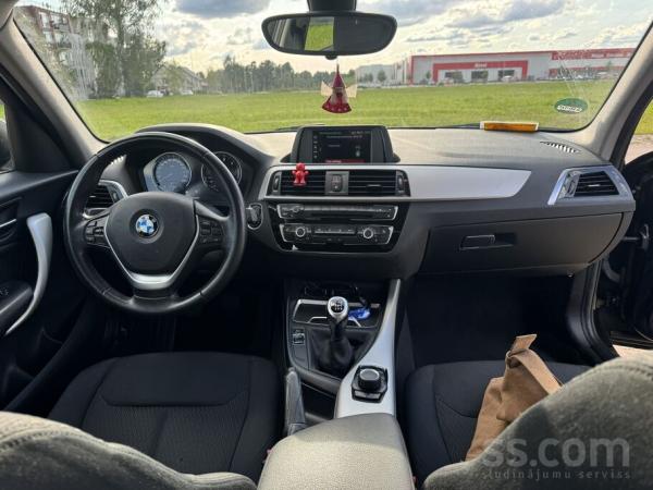 Black BMW 118 2017 in Riga, with an engine capacity of 2.00 L and mileage of 167 thousand km for 10500 €, photo 8 on AUTOMOTO.COM.LV